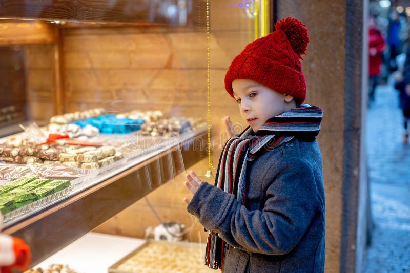 Child in Prague on Christmas, Looking at the Store Windows with Toys ...
