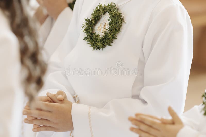 Child Praying with Folded Hands during First Holy Communion Ceremony ...