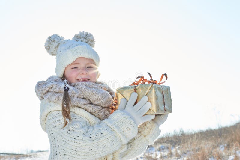 Child with Present for Christmas Stock Photo - Image of outside, gifts ...