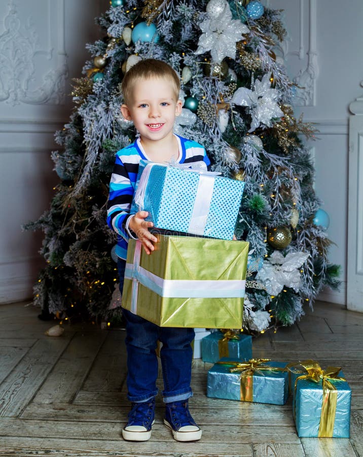 Child with presents stock photo. Image of caucasian, casual - 80740932