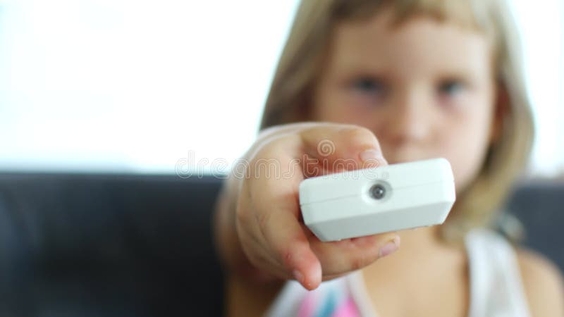 The Child Presses the Remote Control Button. Stock Video - Video of ...
