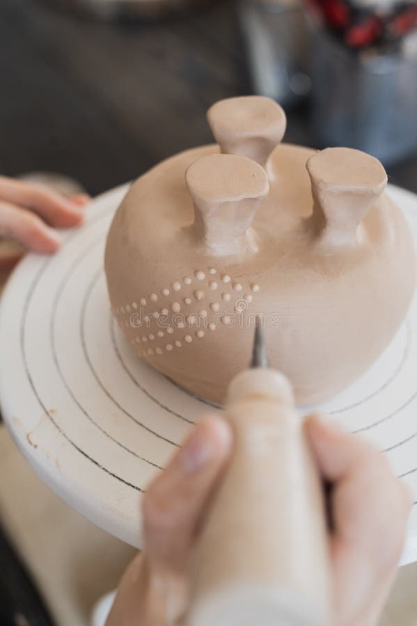 Child in the Process of Decorating the Clay Vase. Children Pottery ...