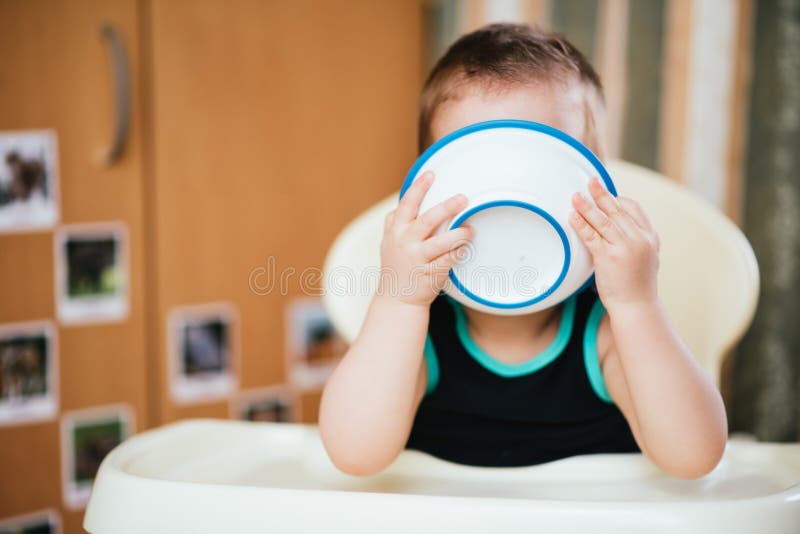 The Child Put a Bowl on His Head Stock Image - Image of little ...