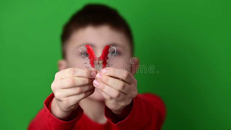 The Child Puts a Plate on the Teeth, Alignment and Care of Teeth ...