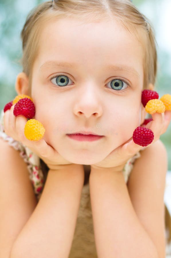 Child with raspberry stock image. Image of freshness - 34021031