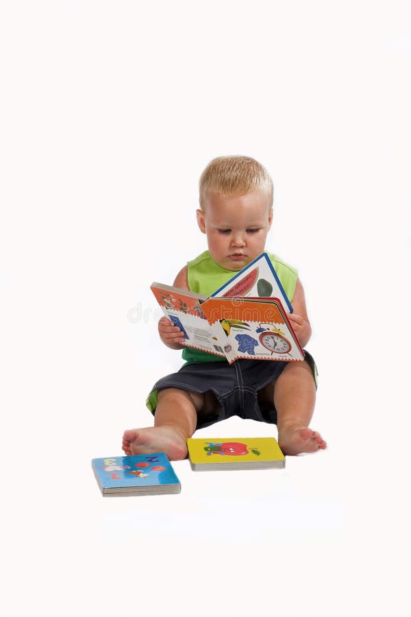 Child Reading Book stock image. Image of exploring, seated - 1015005