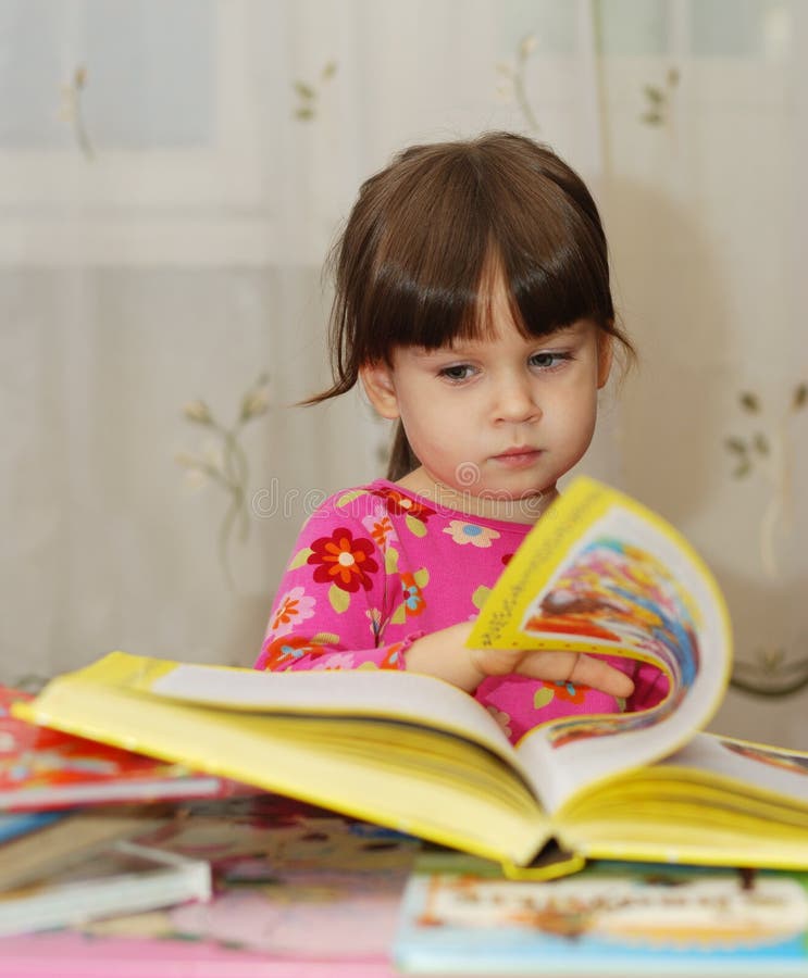 Child reading the book stock photo. Image of assistance - 6887504
