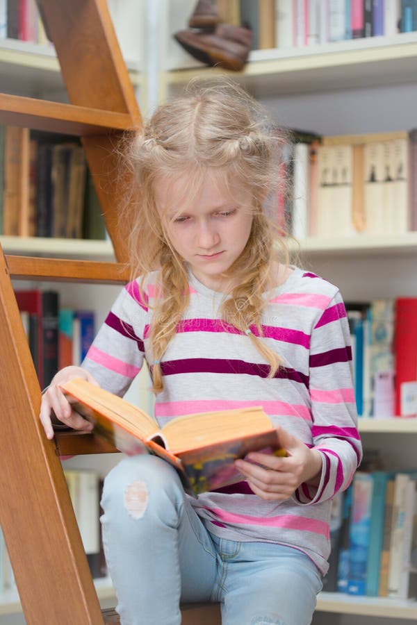 Child reading a book stock image. Image of intent, clever - 8729897