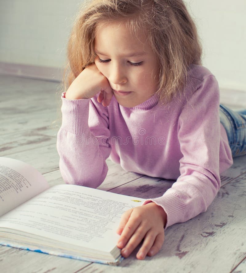 Child reading book stock photo. Image of schoolgirl, studying - 35781668