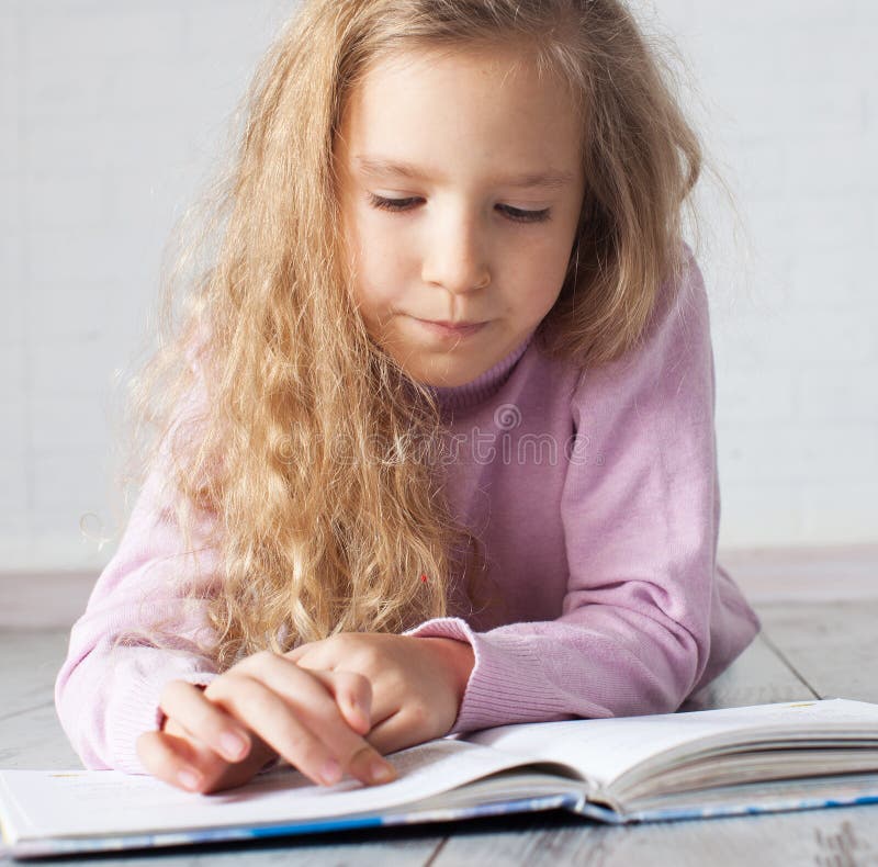 Child reading book stock image. Image of intellectual - 32947205