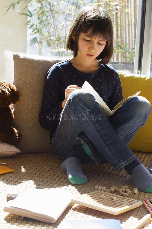 Child Reading a Book, Learning and Studying for Sunny Homeschool Stock ...