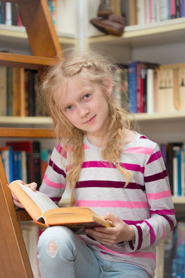 Child reading a book stock photo. Image of learning - 121398970