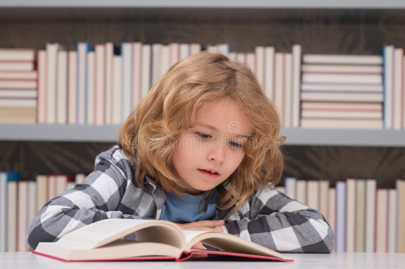 Child Reading Book in a Book Store or Library, Stock Image - Image of ...