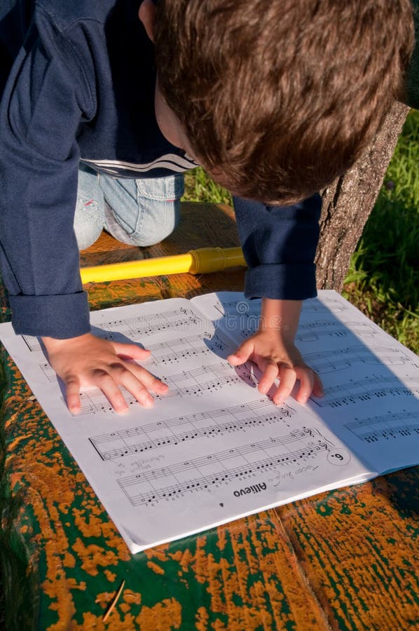 Child reading music stock image. Image of vertical, music - 49332251