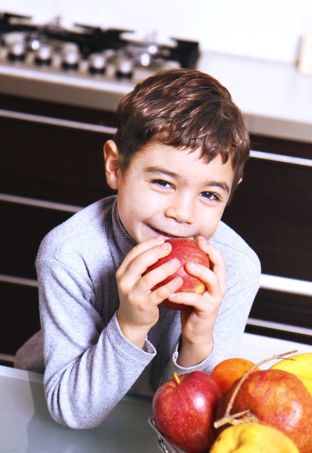 Child with red apple stock photo. Image of healthy, season - 40199708