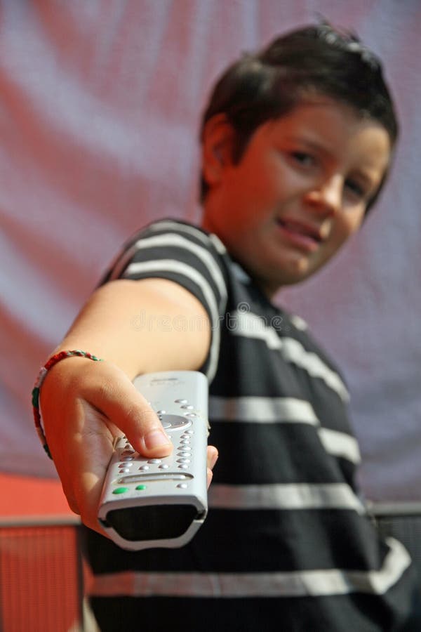 Child with Remote Control Changes Channels on TV Stock Image - Image of ...