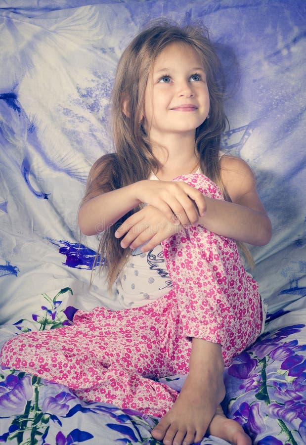 Child resting in bed stock photo. Image of clothing, smile - 35144660