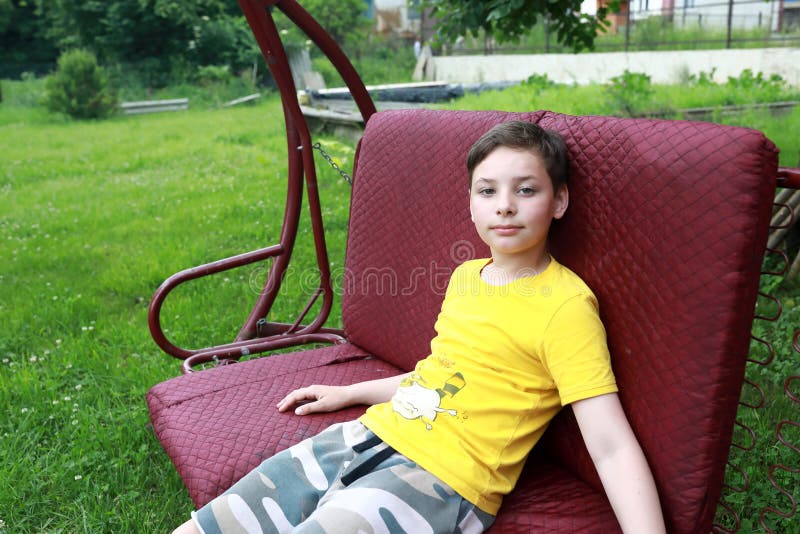 Child Resting on Hanging Sofa Stock Photo - Image of design, cheerful ...