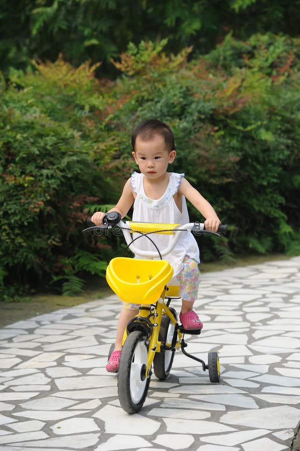 Child Ride bicycle stock photo. Image of excited, female - 25704176