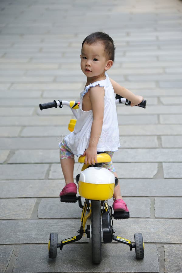 Child Ride bicycle stock image. Image of girl, caucasian - 25704477