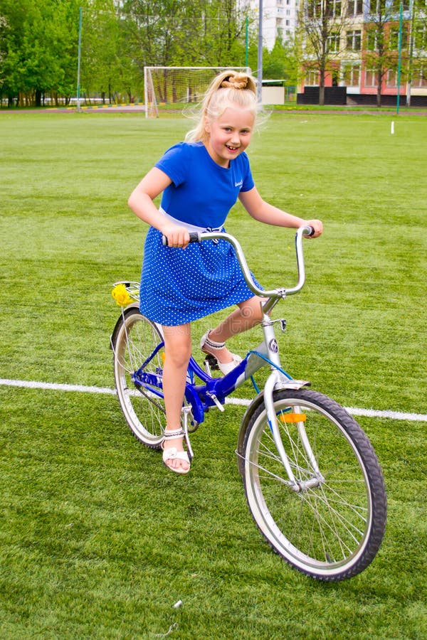 Child riding a bicycle stock photo. Image of happiness - 40761260