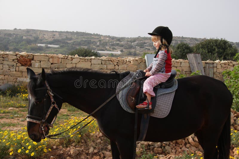 Child riding a horse stock photo. Image of positive, pony - 13917024