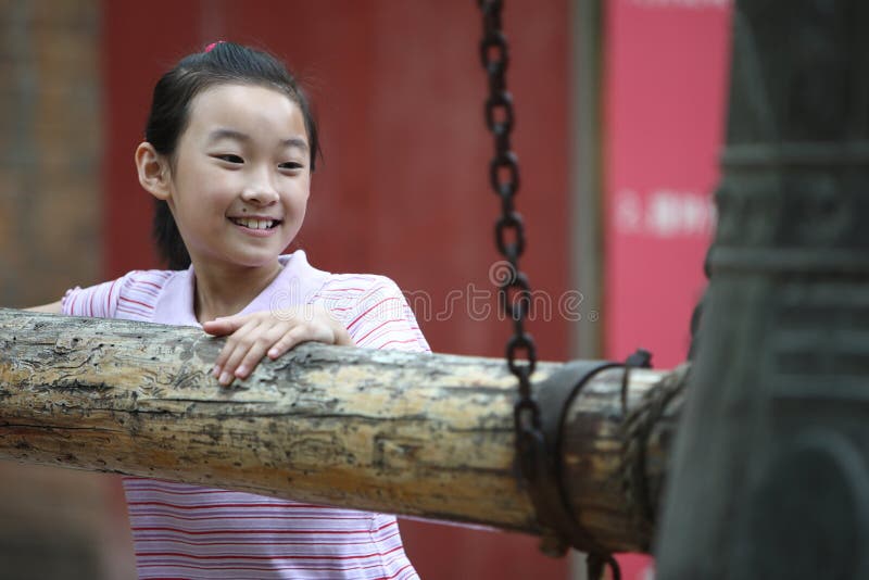 Child ringing bells stock image. Image of china, beautiful - 23741025