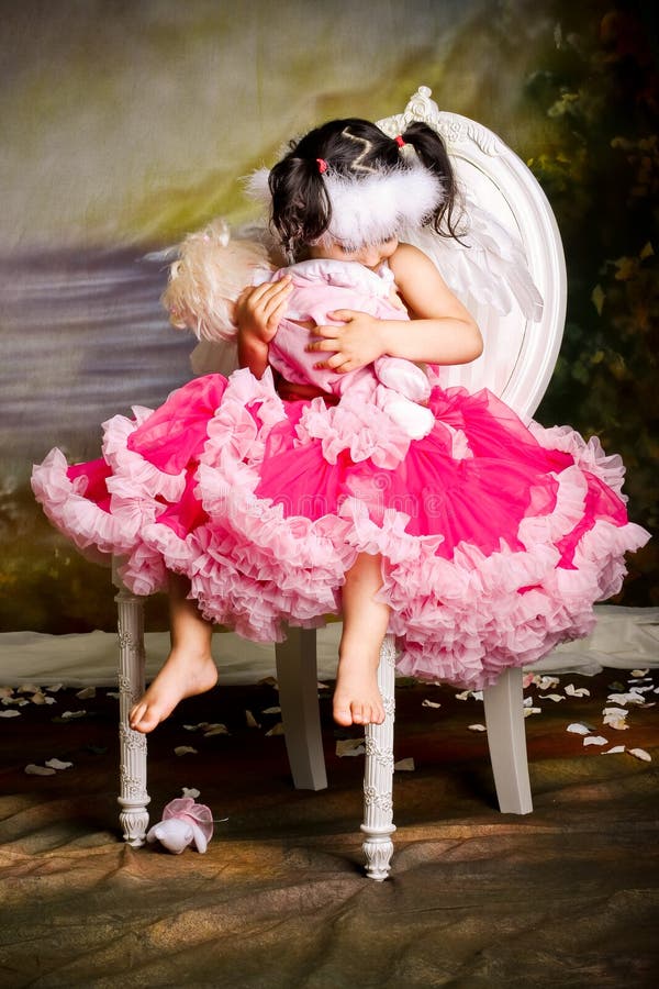 Child role playing stock image. Image of garden, dolly - 5629789