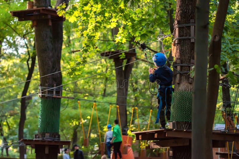 Child on Rope Course Attraction Editorial Stock Photo - Image of moving ...