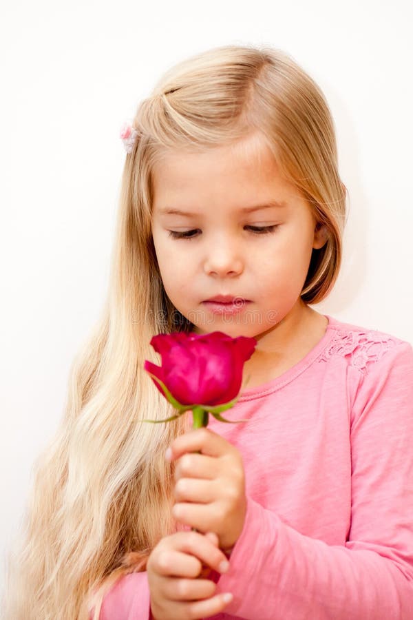 Child with Rose stock photo. Image of longhair, head - 78873272