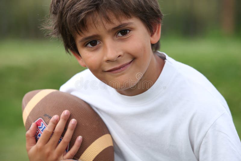 Child with rugby ball stock photo. Image of shirt, shaking - 31133938