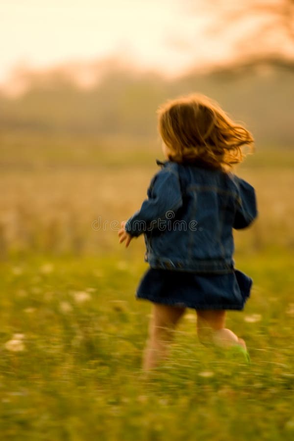 Child Running in Field at Sunset Stock Photo - Image of exciting, days ...