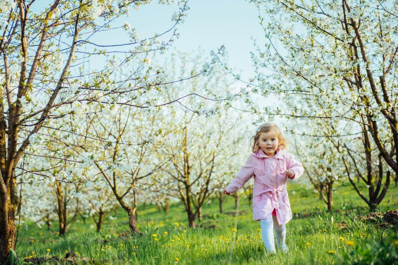 Child Running Outdoors Blossom Trees. Art Processing and Retouch Stock ...