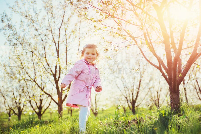 Child Running Outdoors Blossom Trees. Stock Image - Image of childhood ...