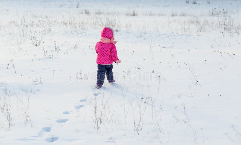 A Child Running in the Snow Stock Photo - Image of landscape, weather ...