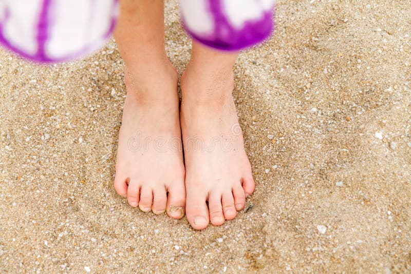Child s bare feet in sand stock image. Image of feet - 43569227