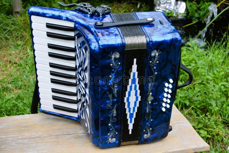 A Child S Blue and White Accordion Editorial Photo - Image of machine ...