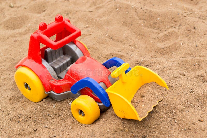 Child S Bright Plastic Digger Toy Stock Photo - Image of bulldozer ...