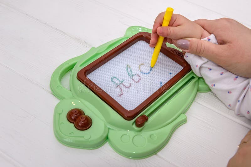 Child`s Education with Plastic Magnetic Rewritable Board Stock Image ...