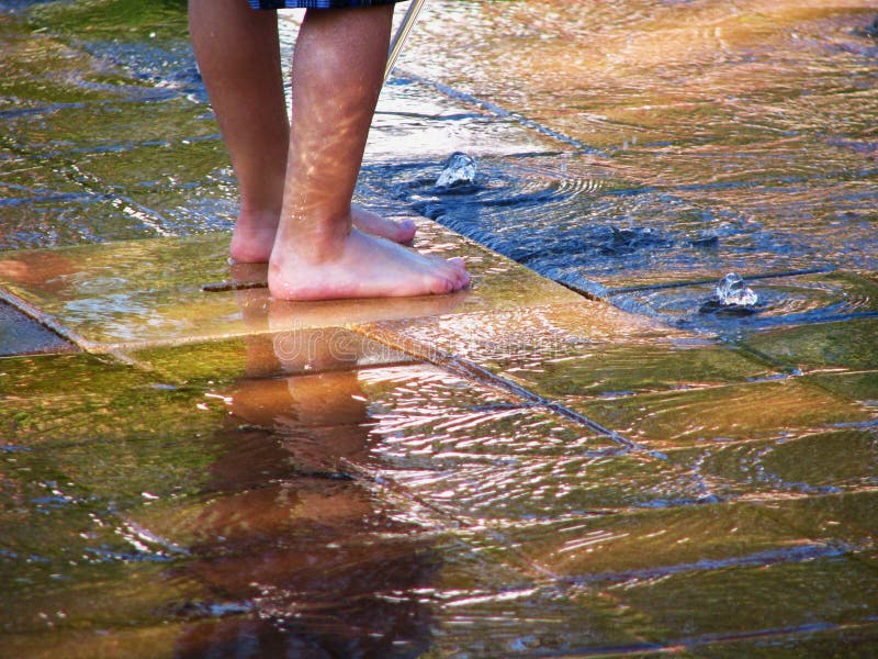 Child S Feet at a Water Playground or Puddle Stock Image - Image of ...