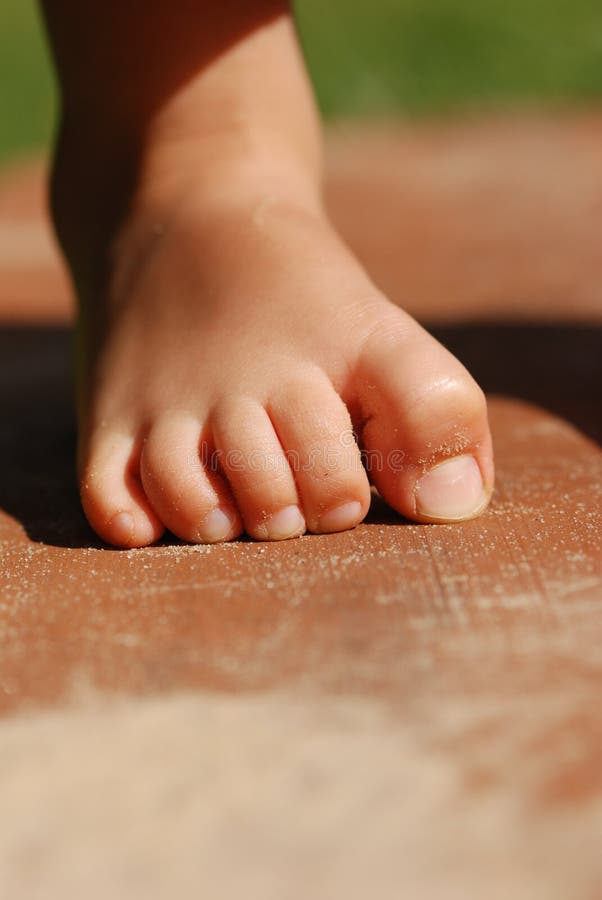 Child s Foot stock photo. Image of small, sand, foot - 10807974