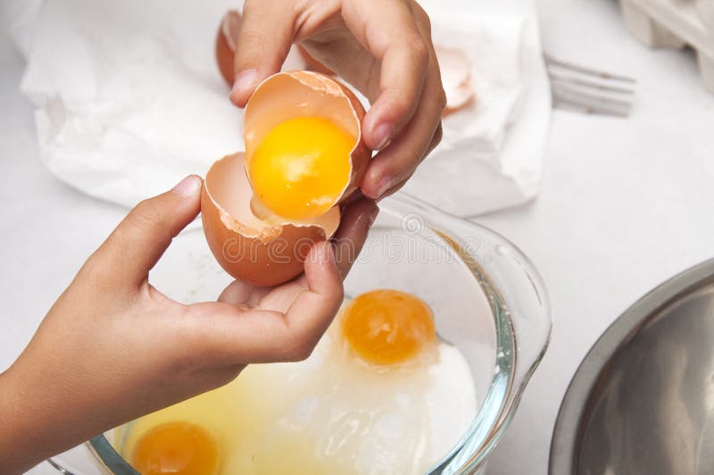 Child S Hand Breaking an Egg for Pastry Stock Image - Image of child ...