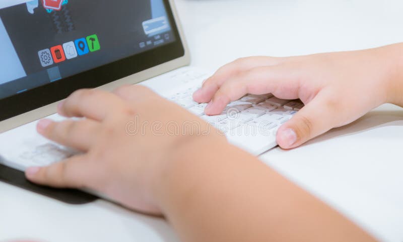 Child`s Hand on Computer Keyboard Play Game Stock Photo - Image of ...