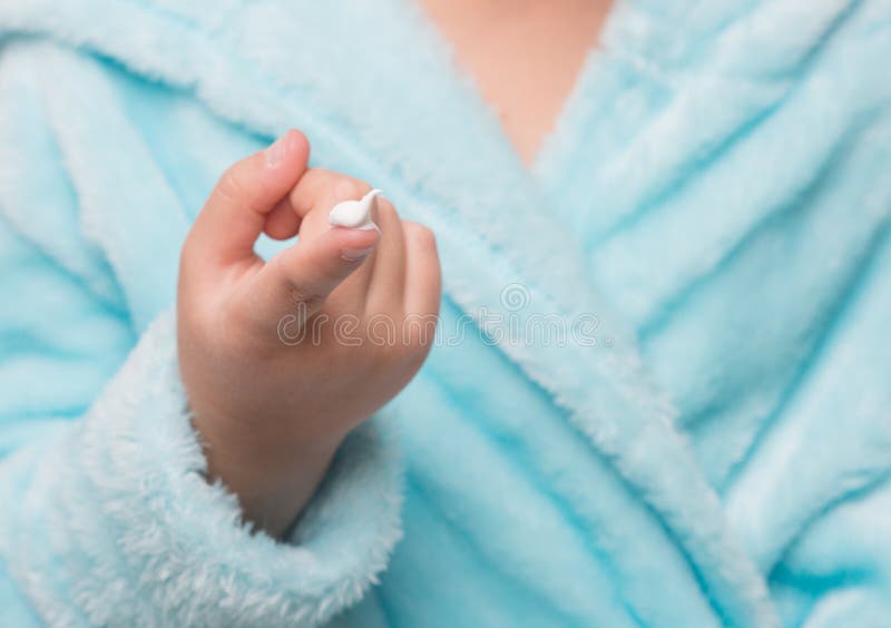 Child S Hand with Cream on a Finger Stock Photo - Image of blue, hand ...