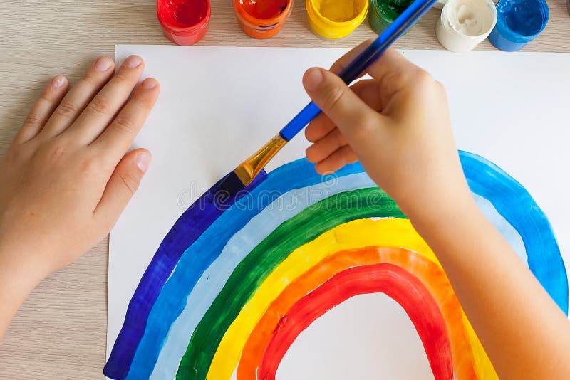 Child& X27;s Hand Draws a Rainbow on a White Background. Stock Image ...