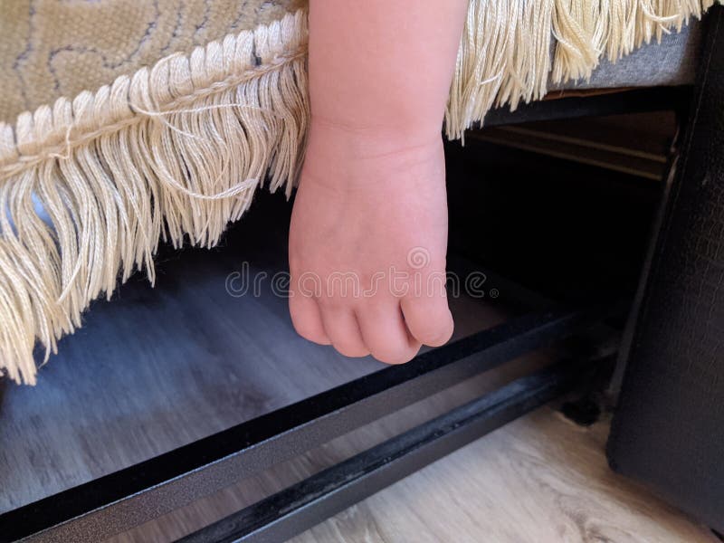 Child S Hand Fell from the Bed while Sleeping Stock Photo - Image of ...