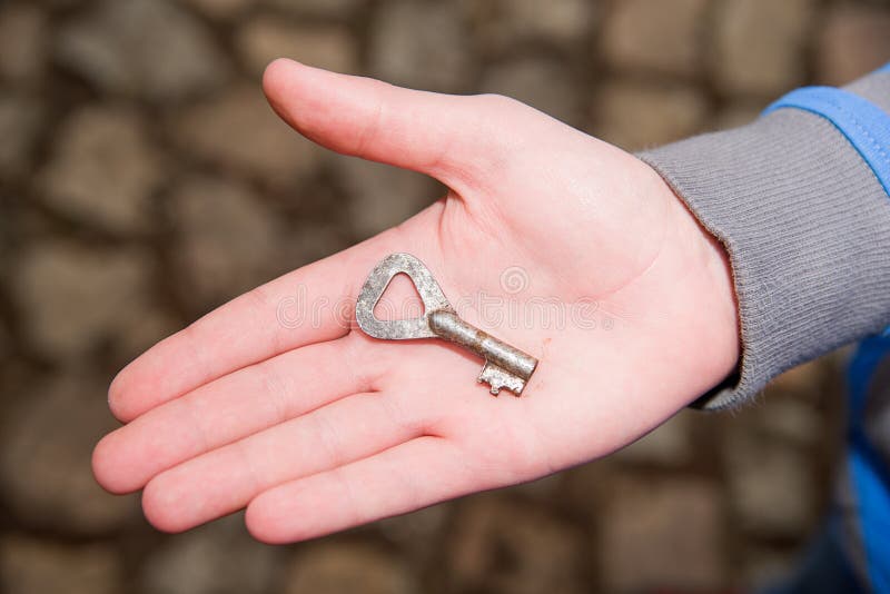 Child S Hand Holding One Old Key Stock Image - Image of door, latch ...