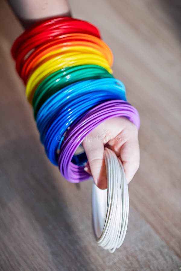 A Child& X27;s Hand Holds a Multi-colored Plastic for Creativity ...
