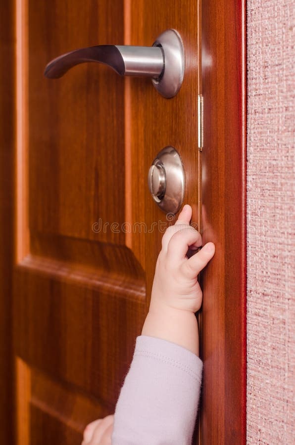 Child`s Hand Stretches Up To the Door Handle Stock Image - Image of ...
