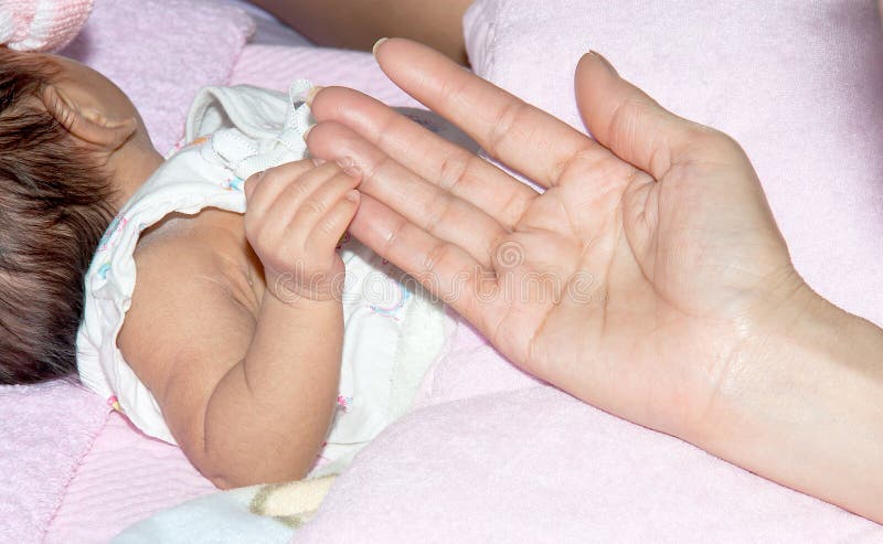 Child S Hand with Tenderness Stock Photo - Image of parenting, baby ...